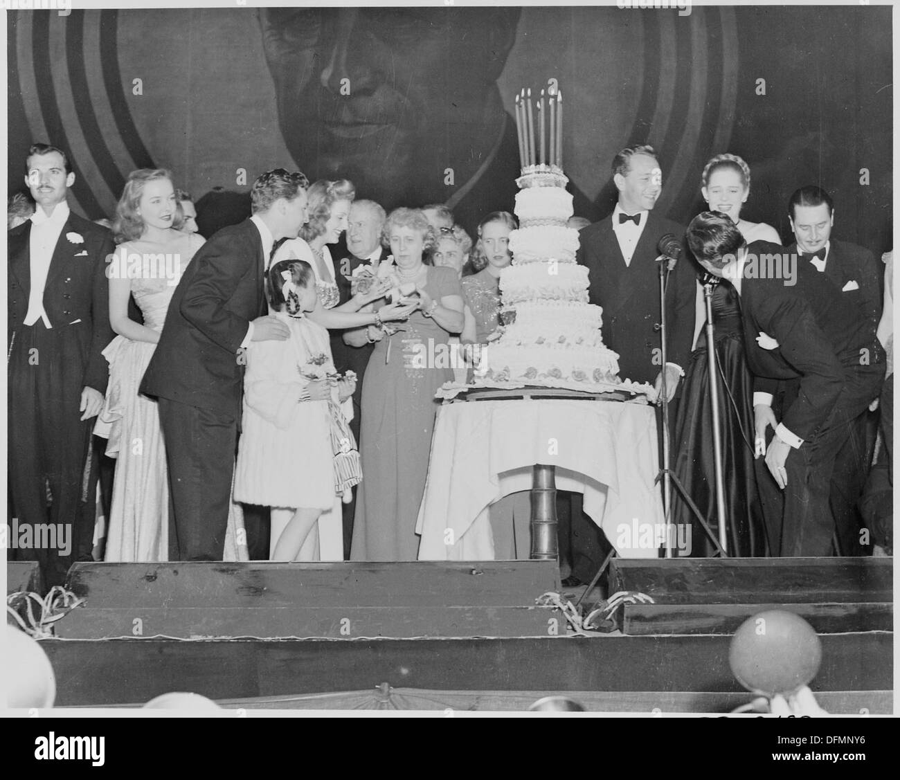 First Lady Bess Truman is seen distributing birthday cake to Hollywood ...