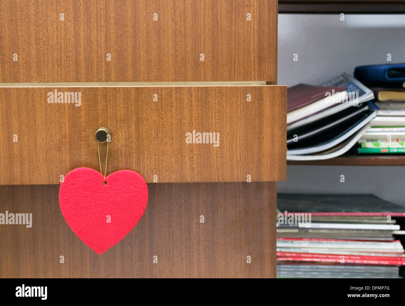 Red Heart Hanged on Drawer Stock Photo - Alamy