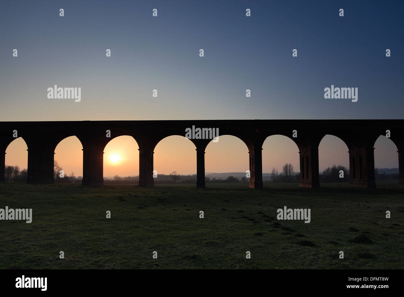 Sunset over the Harringworth Railway Viaduct, river Welland valley ...