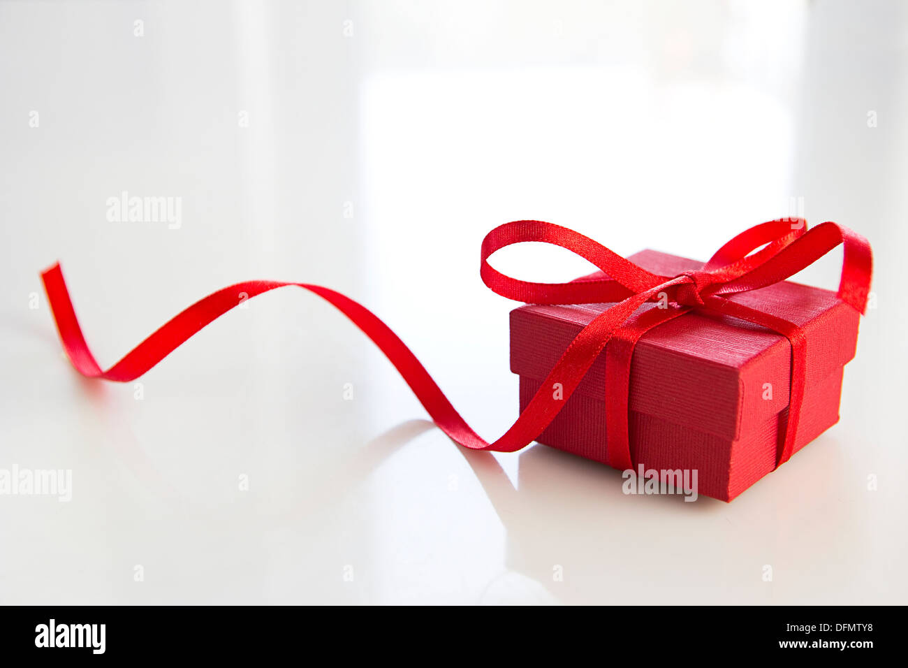 Red ribbon isolated over hi-res stock photography and images - Alamy