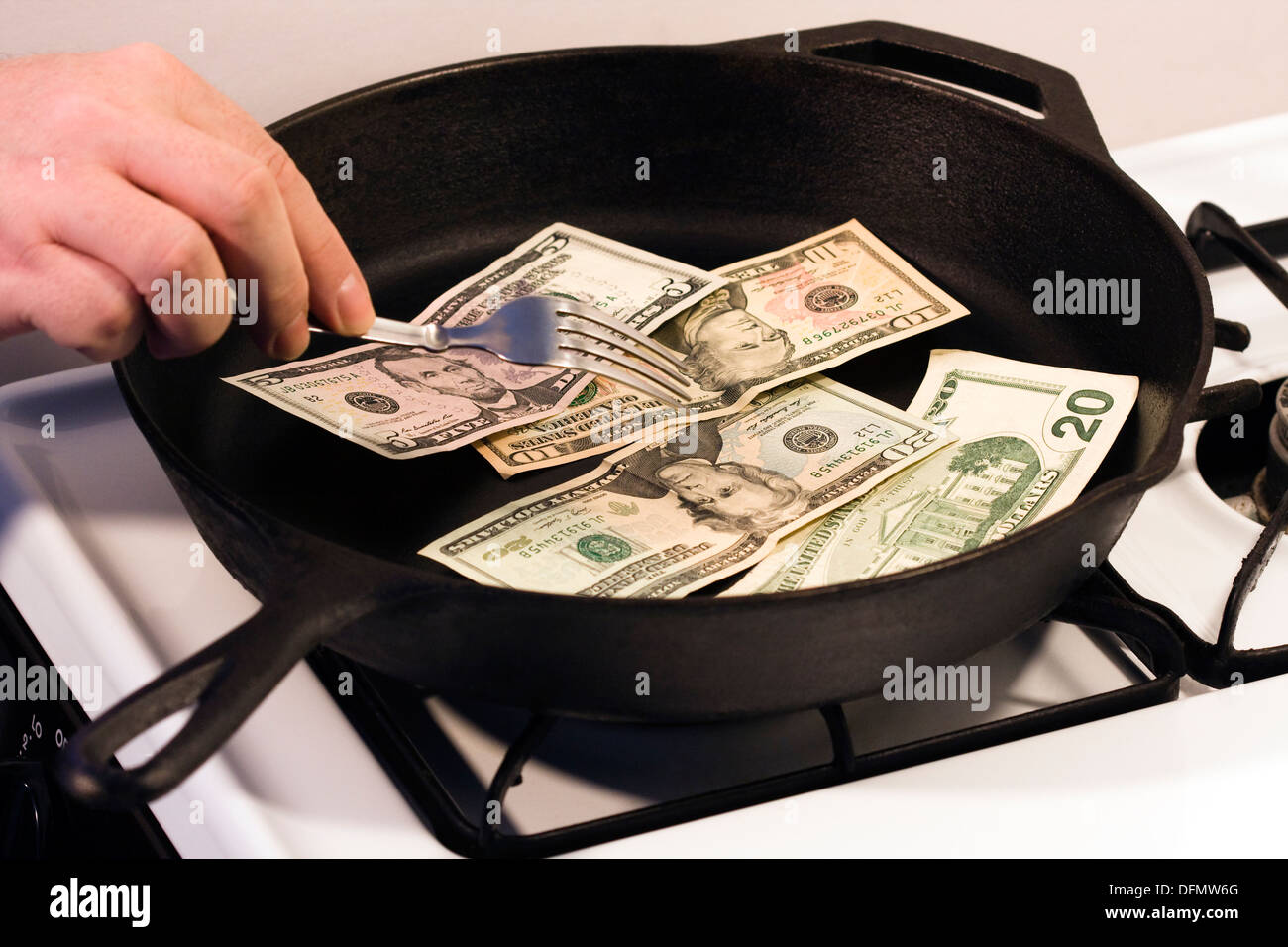 Burning hand on pan hi-res stock photography and images - Alamy