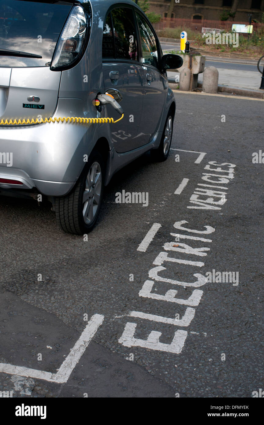 Hackney, London 2013. Charging electric car on the street Stock Photo ...