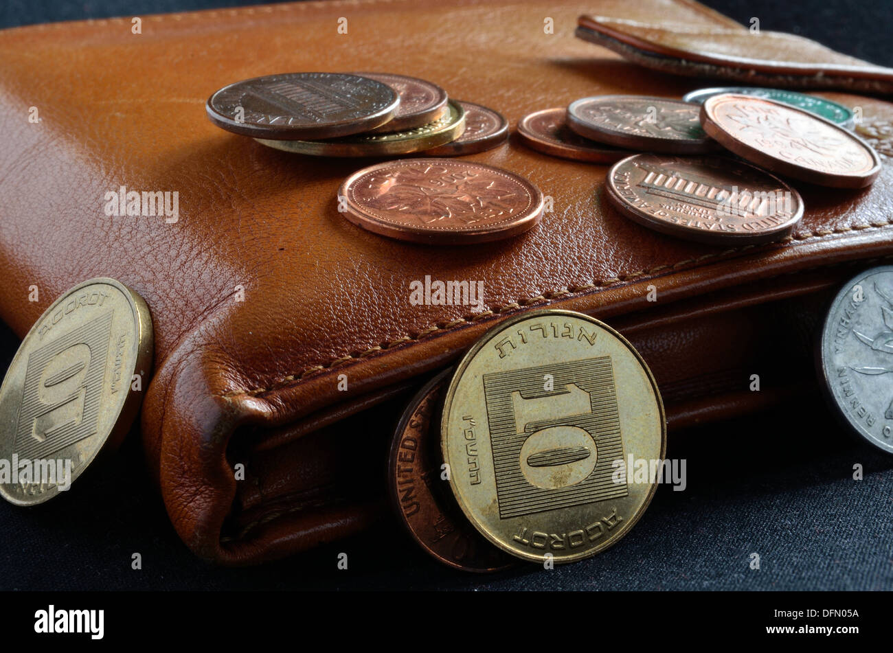 Open purse coins hi-res stock photography and images - Alamy