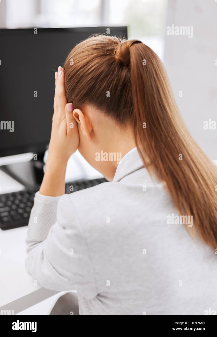 stressed woman with computer Stock Photo - Alamy