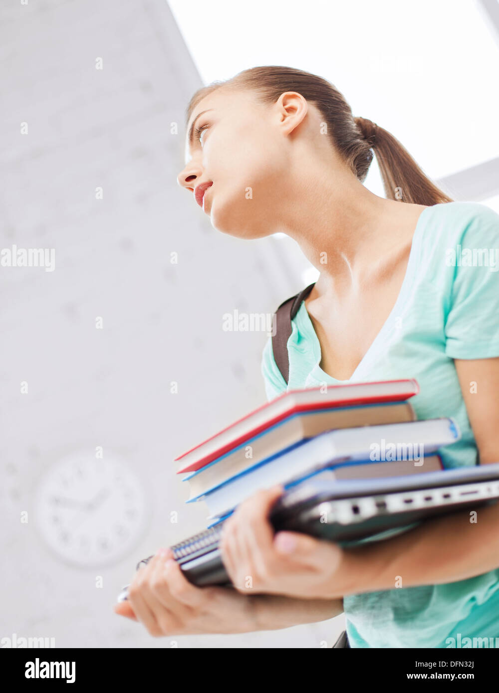 student with books, computer and folders Stock Photo - Alamy