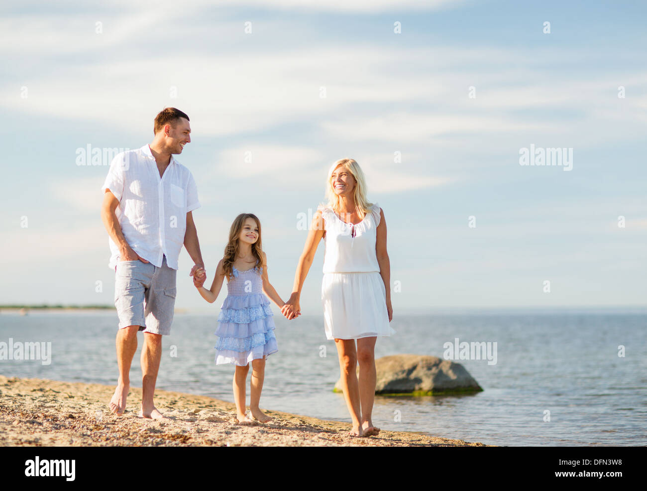 happy family at the seaside Stock Photo - Alamy