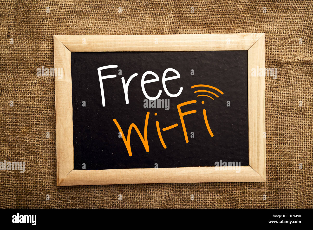 Free WiFi message on black notice board Stock Photo - Alamy