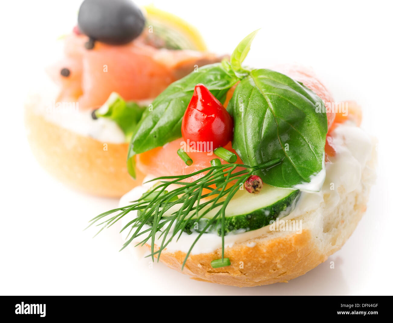 Sandwich with red fish isolated on a white background Stock Photo - Alamy