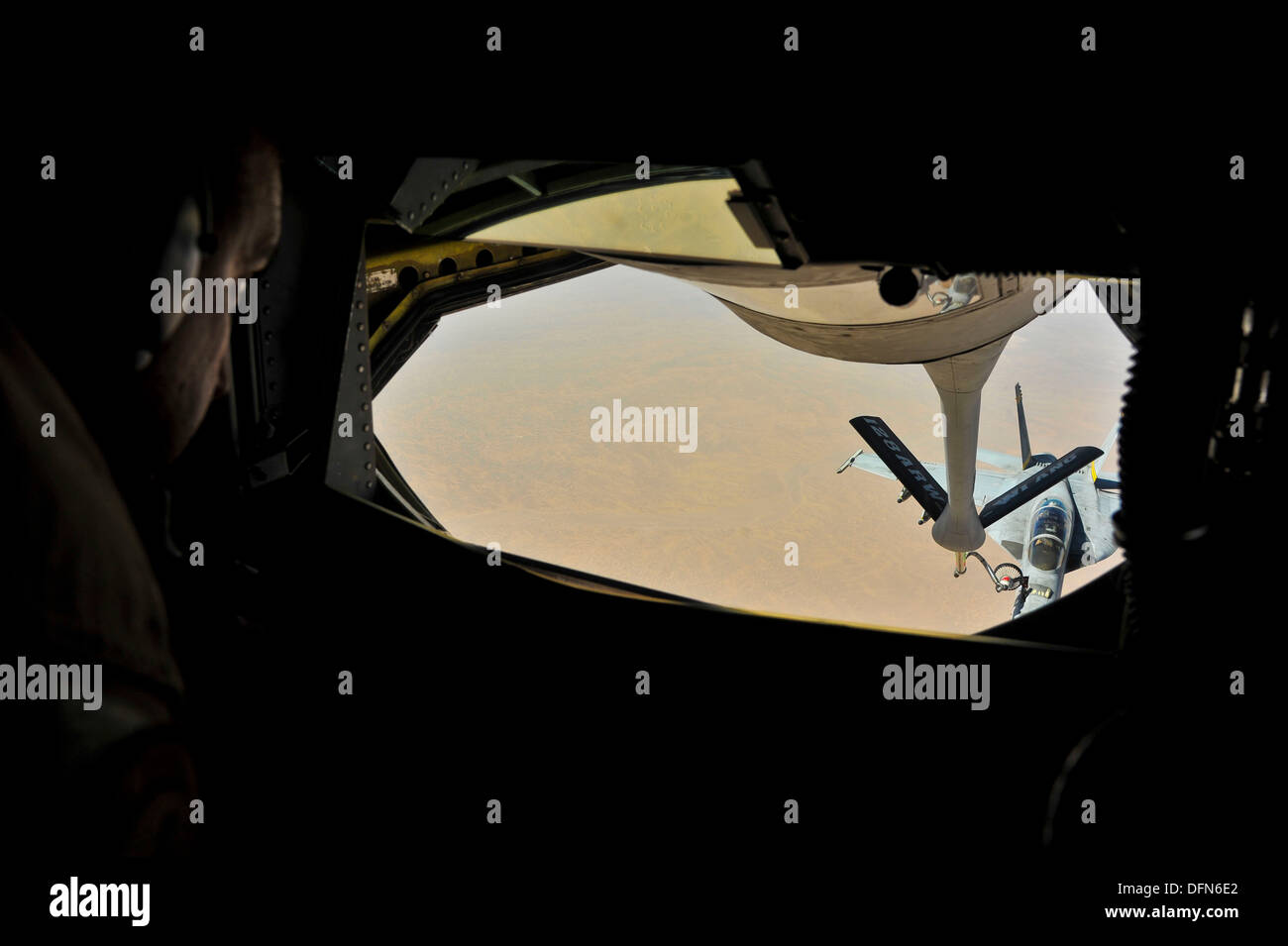 Tech. Sgt. Jordan Jungwirth IV operates the boom from a pod in the back ...