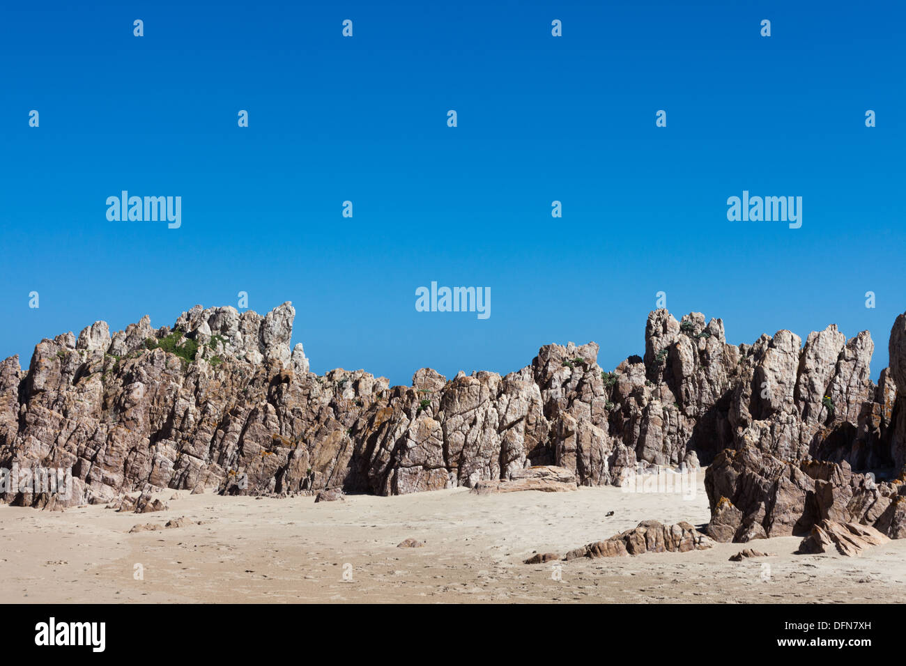 Rocks on a beach Stock Photo - Alamy
