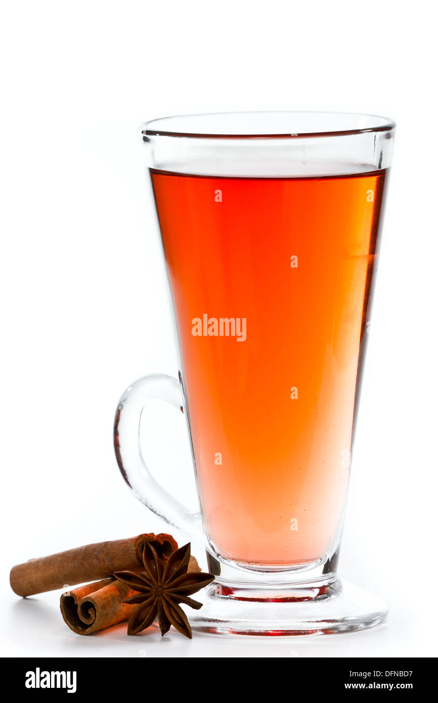 red tea served in a tall glass isolate don a white background with ...