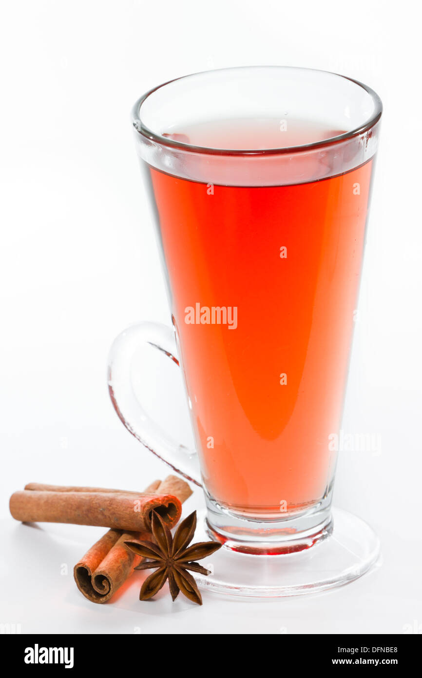 red tea served in a tall glass isolate don a white background with ...