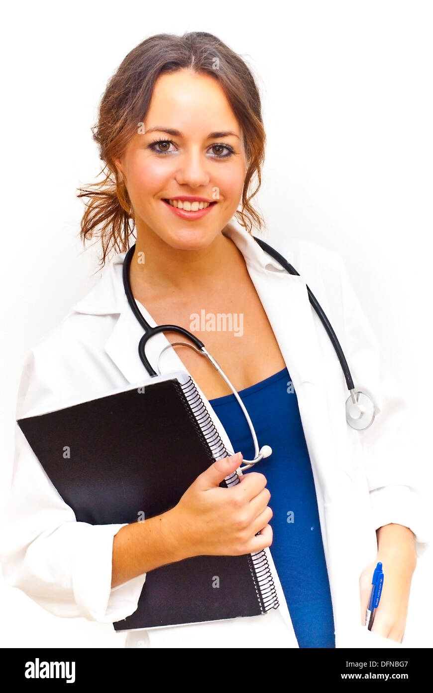 Pretty medical doctor woman over white background Stock Photo - Alamy