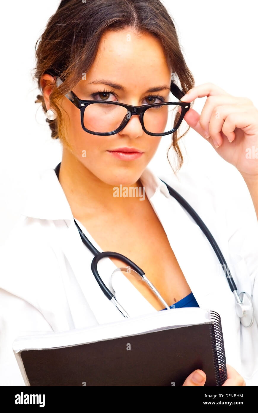 Pretty medical doctor woman with glasses and stethoscope over white ...