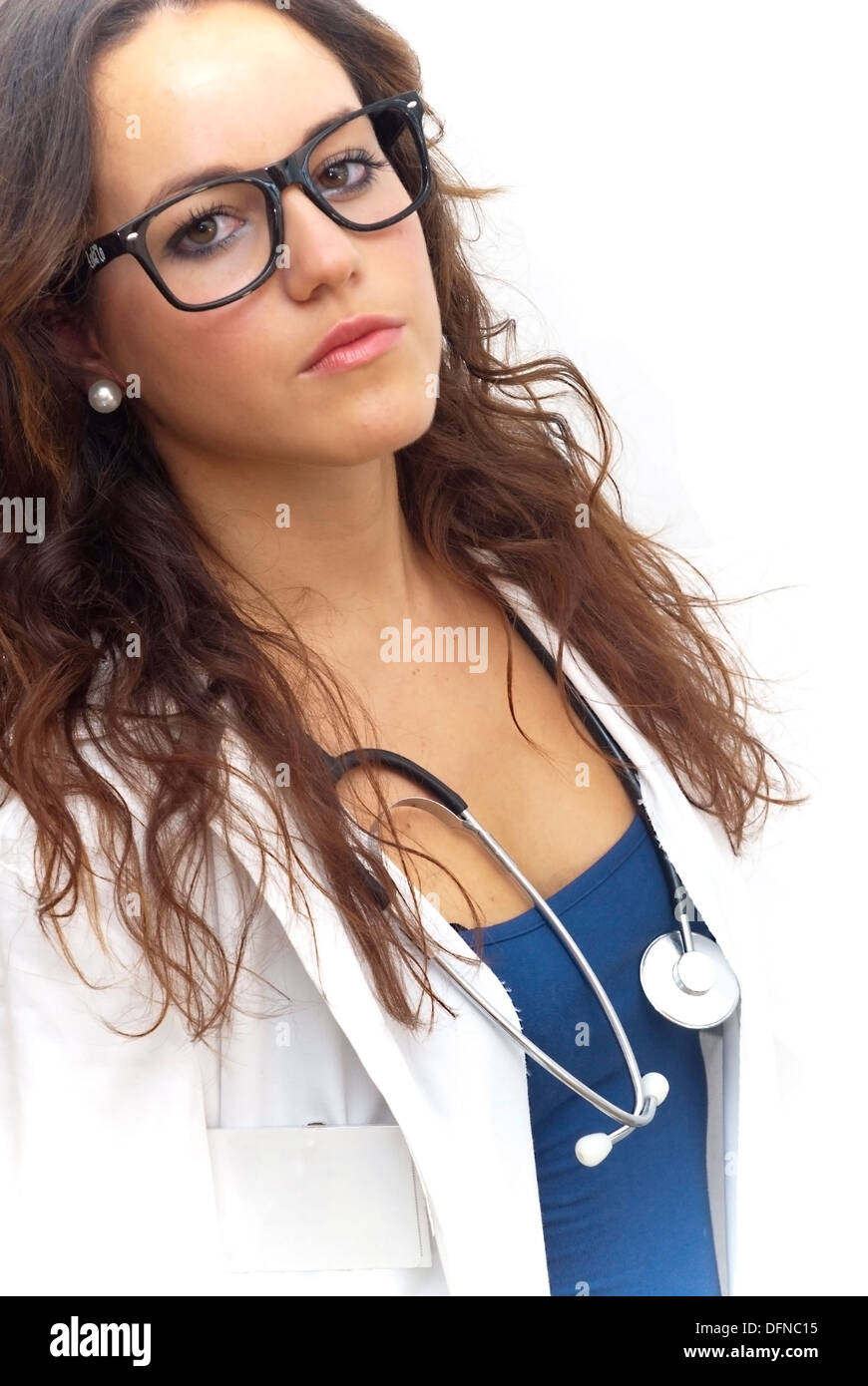 Pretty medical doctor woman with glasses and stethoscope over white ...