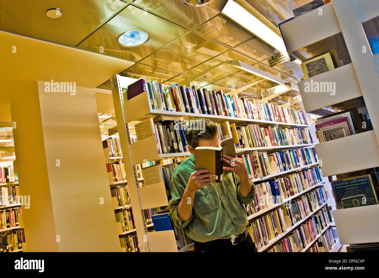 Man reading book anonymous hi-res stock photography and images - Alamy