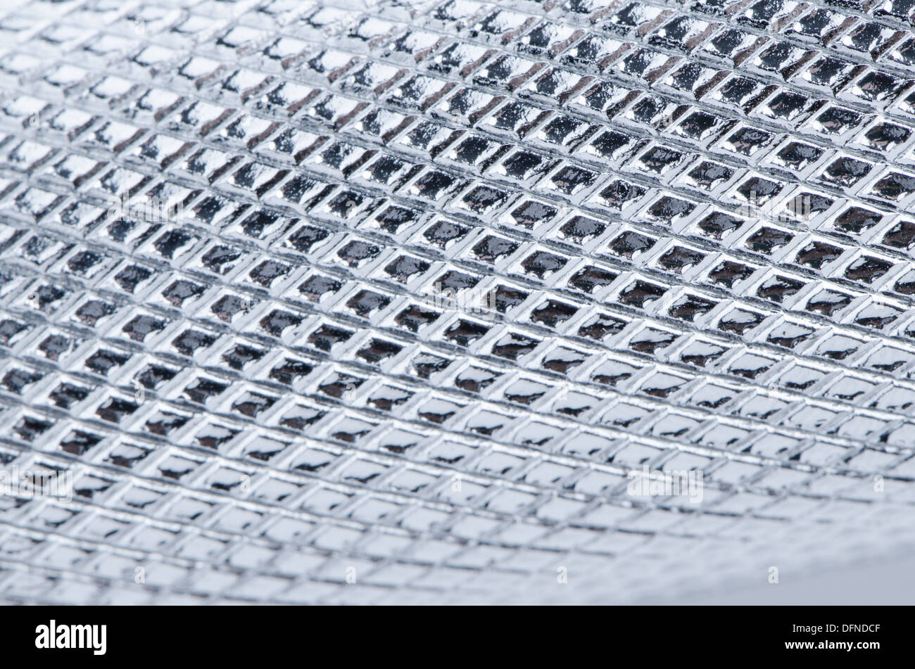 Metal mesh plating isolated against a white background Stock Photo - Alamy