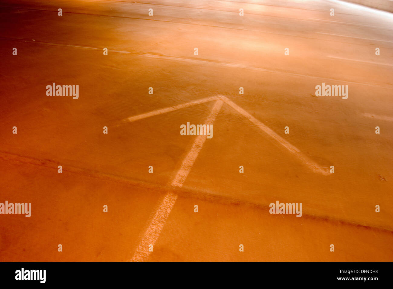 Painted arrow on parking lot hi-res stock photography and images - Alamy