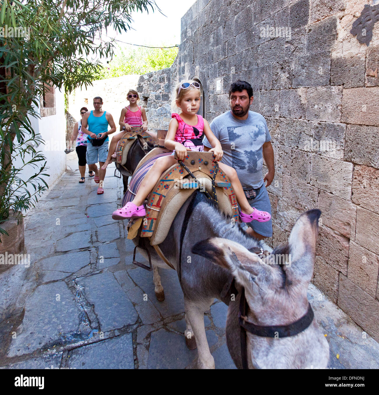 Children riding a donkey hi-res stock photography and images - Alamy