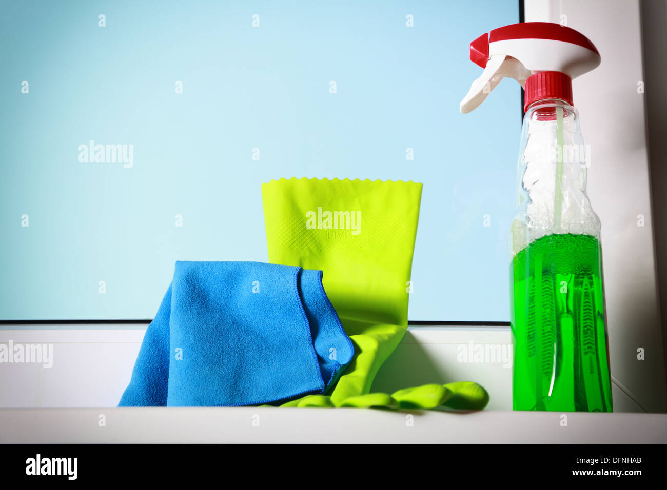 Cleaning window using tools - rag and spray detergent. Spring cleaning ...