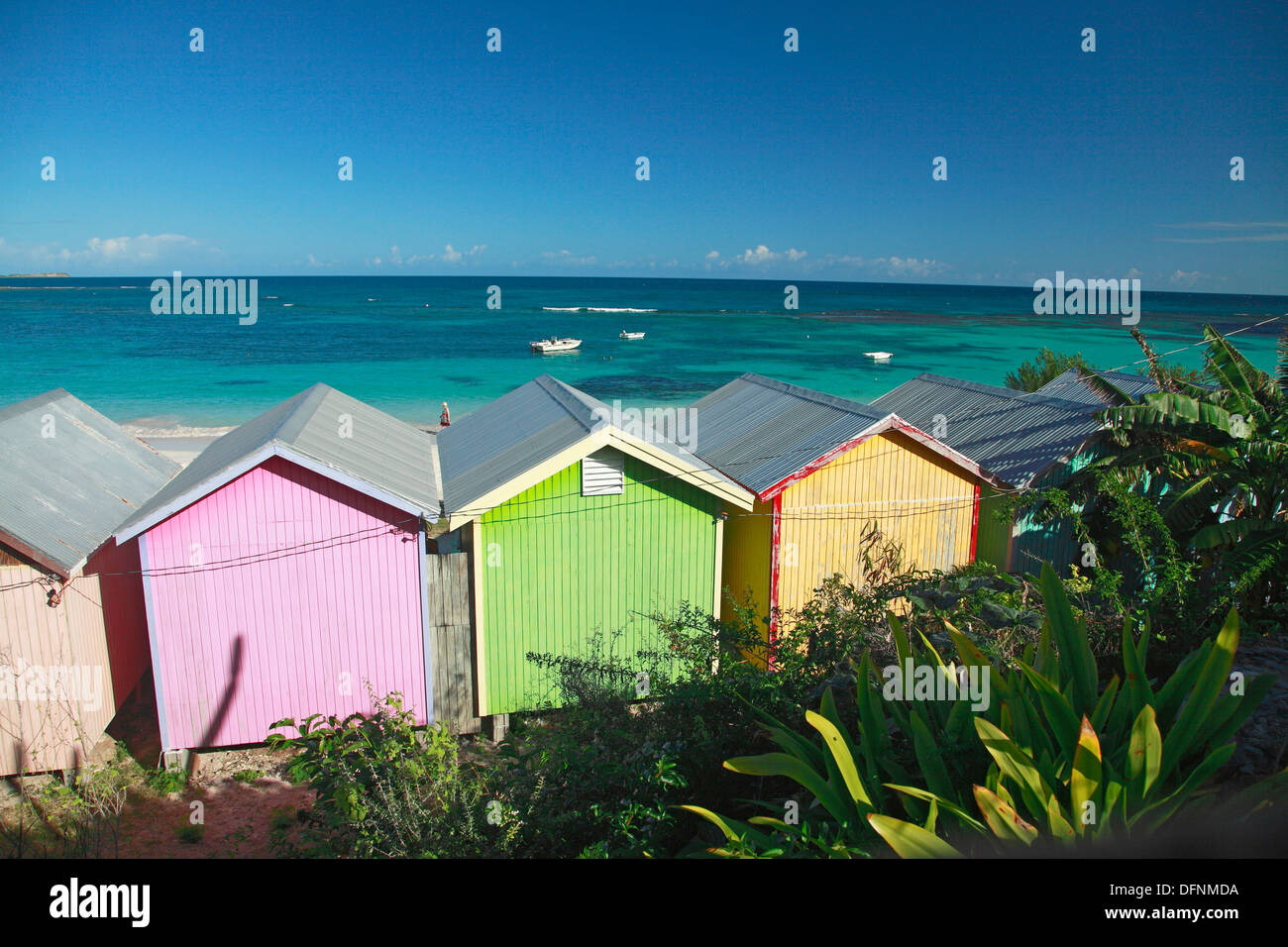 Colourful beach huts on the beach, Atlantic Coast, Antigua, West Indies ...