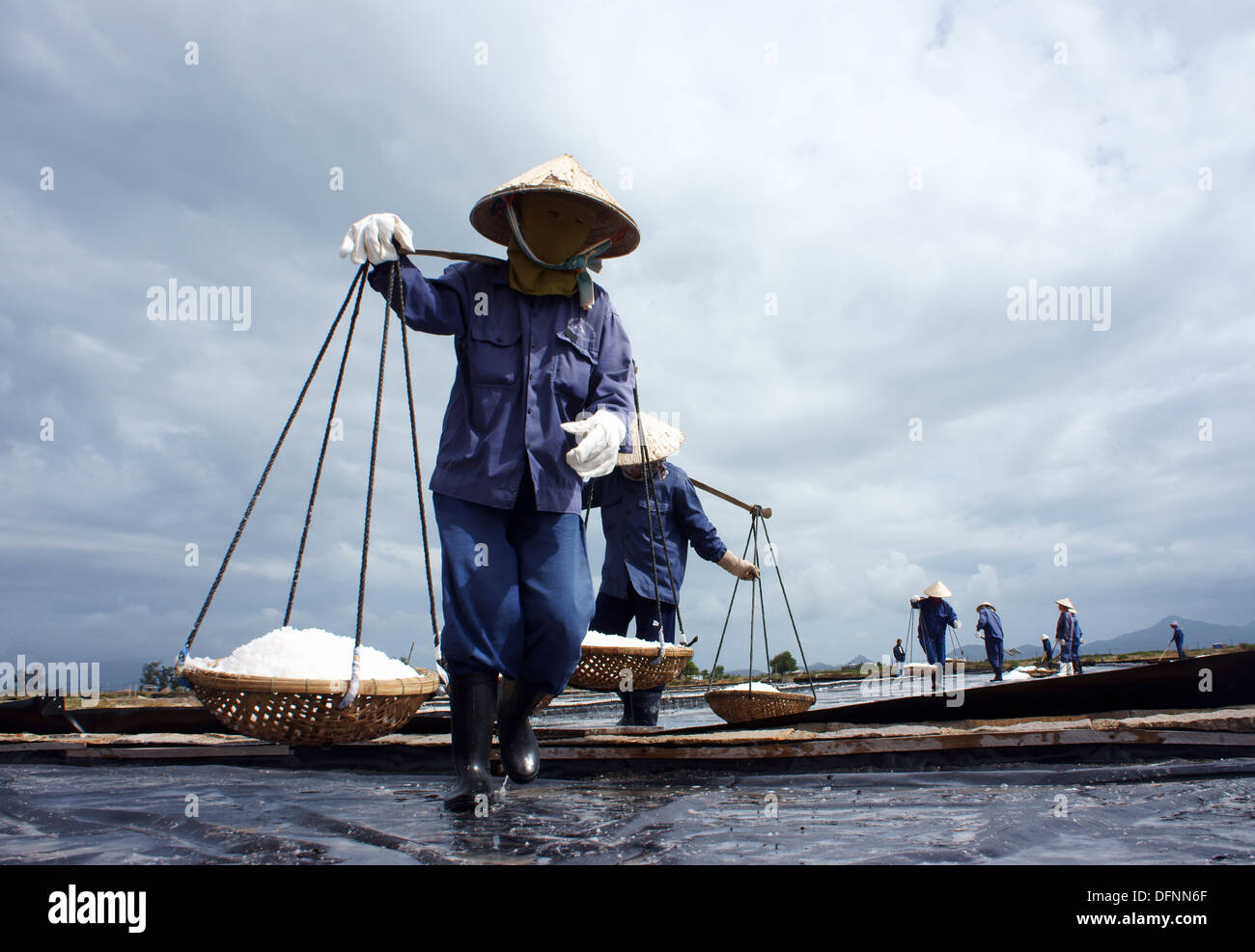 salt worker working on saline Stock Photo - Alamy
