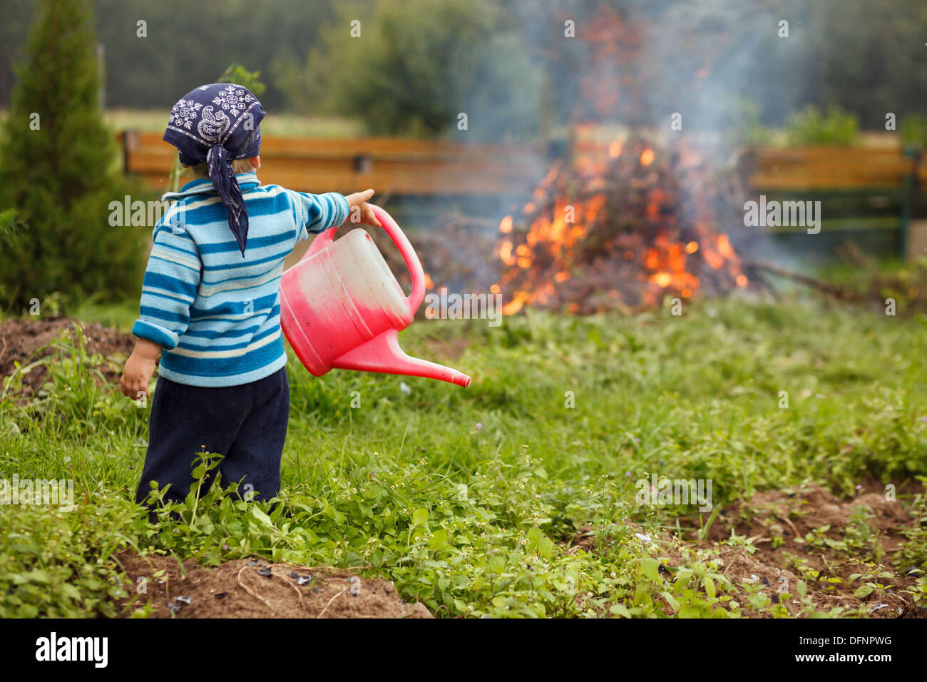 Boy at big fireplace Stock Photo - Alamy