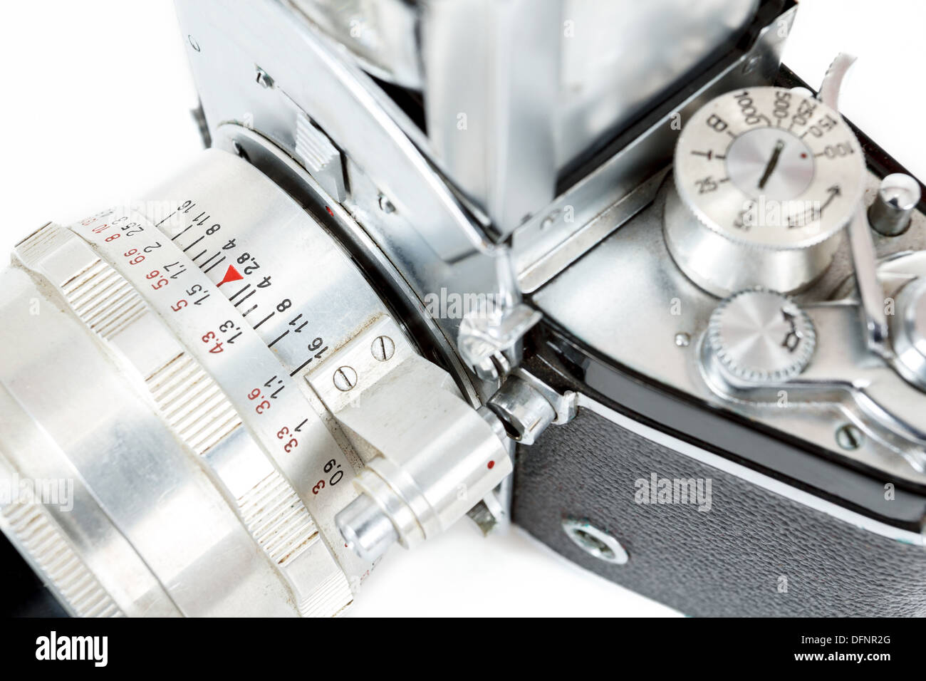 detail of retro old vintage analog photo camera on white background ...