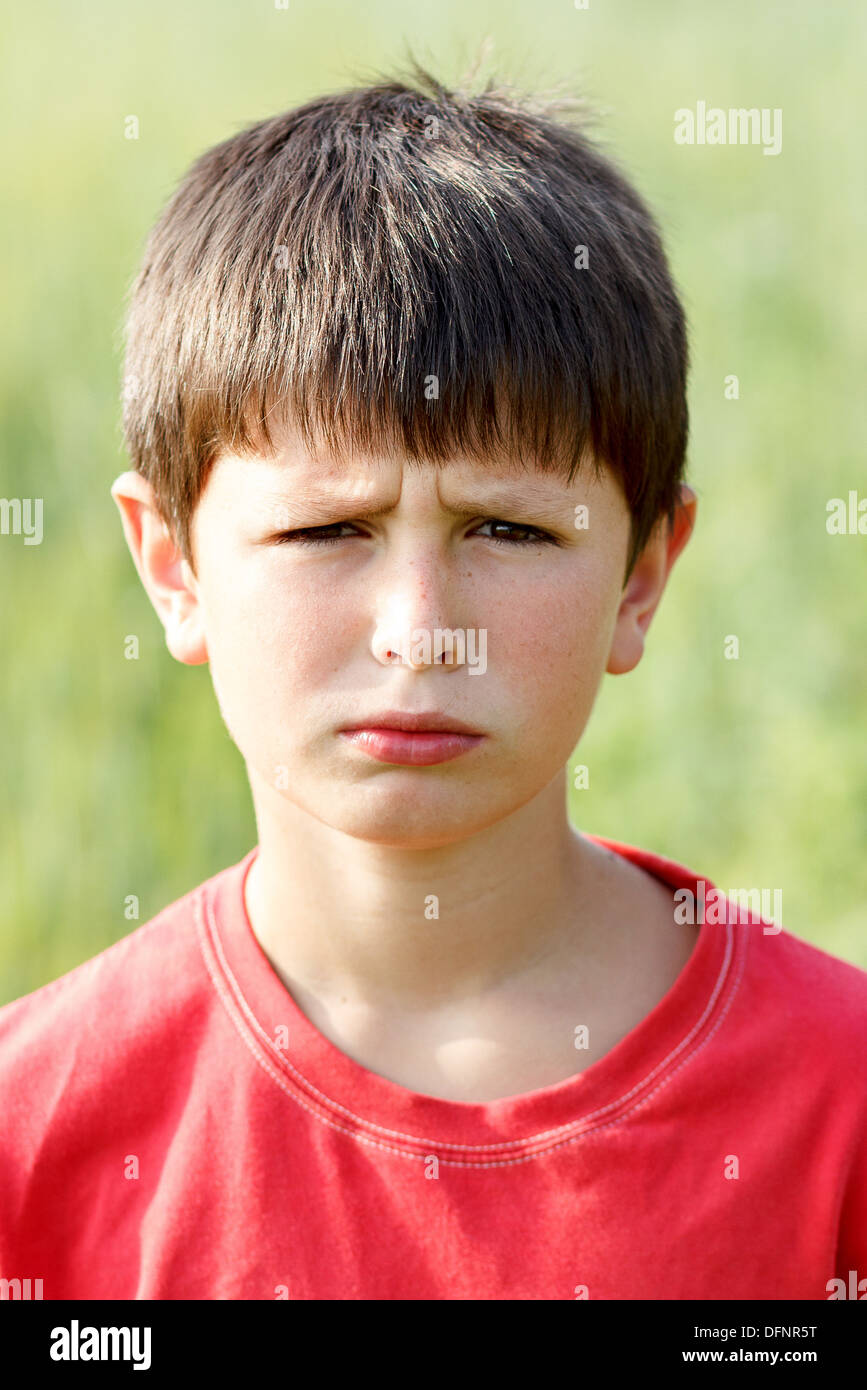 outdoor portrait of sad young teenager boy with shallow focus Stock ... outdoor portrait of sad young teenager boy with shallow focus Stock ...