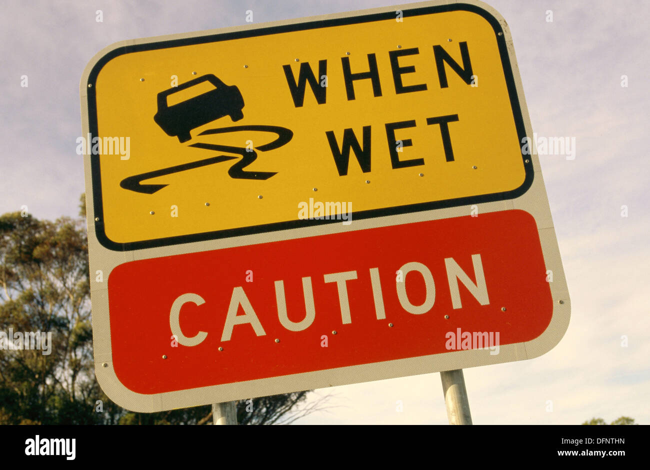 Caution wet road hi-res stock photography and images - Alamy