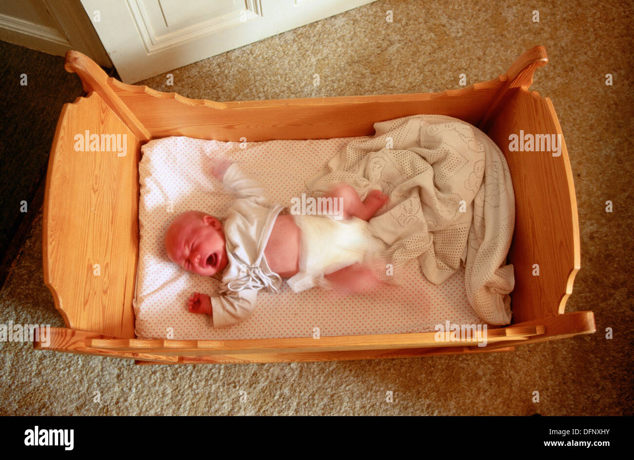 Baby crying alone hi-res stock photography and images - Alamy