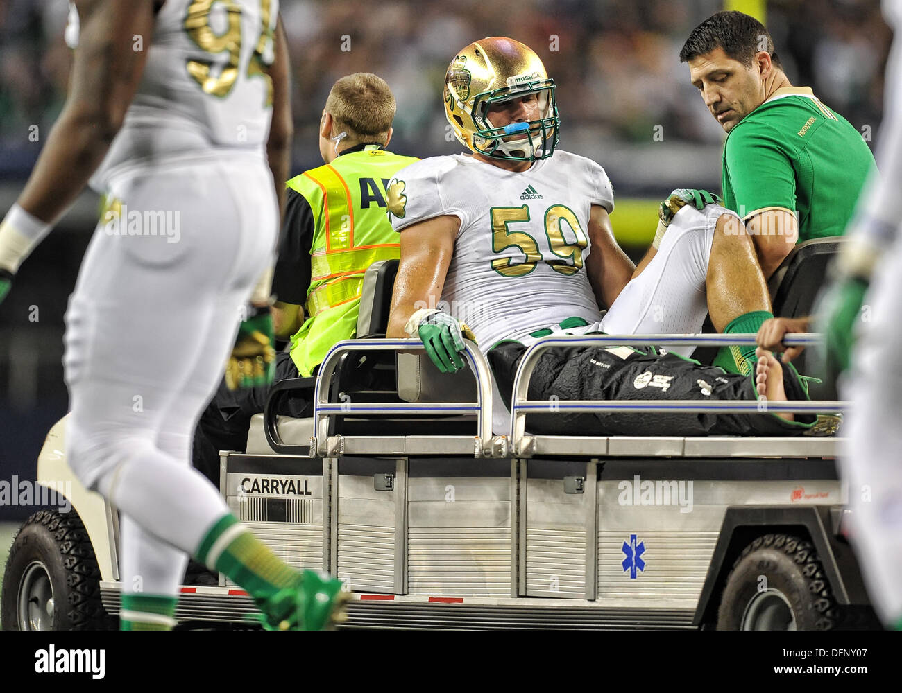 Notre Dame Fighting Irish linebacker Jarrett Grace (59) breaks his leg ...