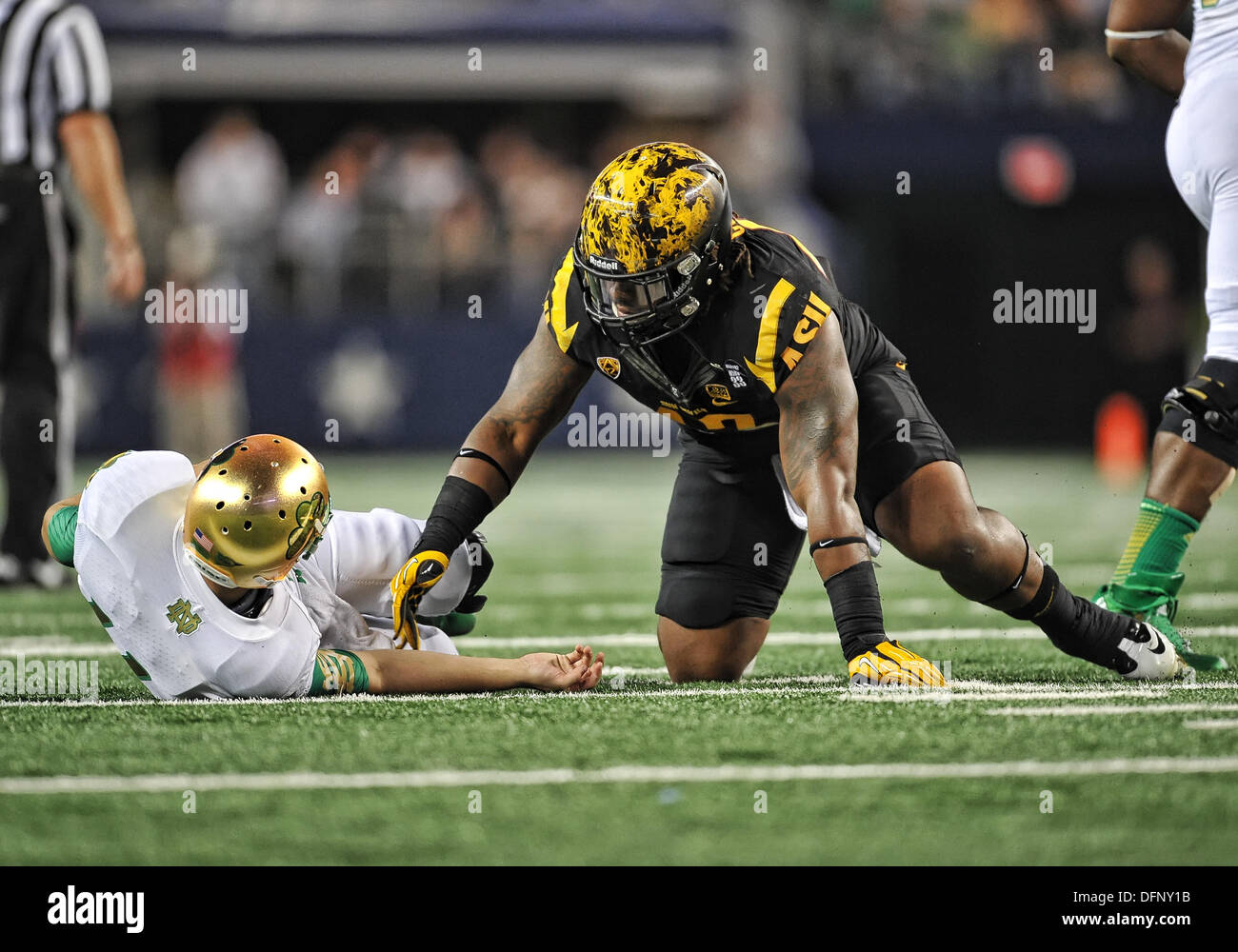 Notre Dame Fighting Irish quarterback Tommy Rees (11) is hit hard by ...