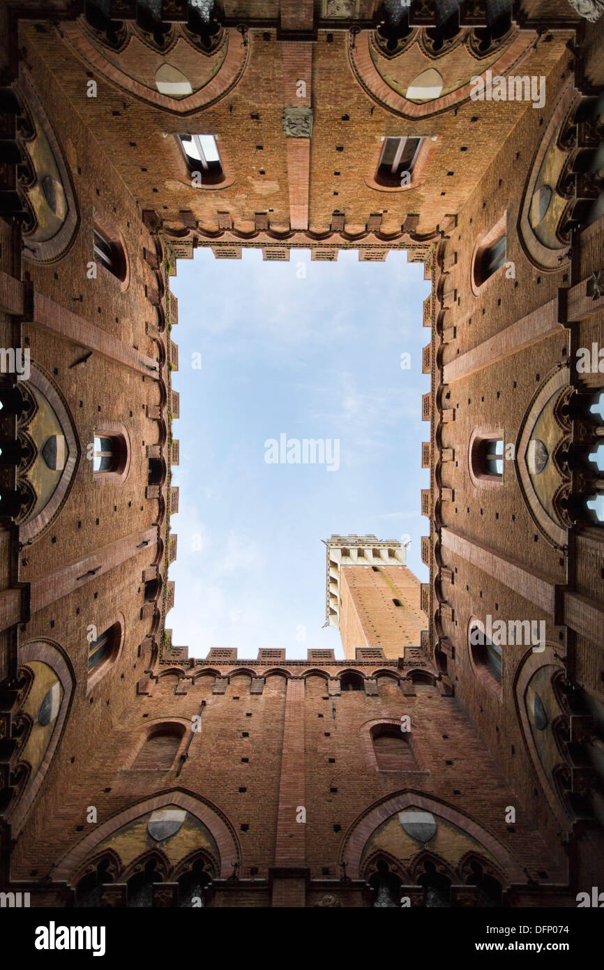 Low angle view of Torre Del Mangia Tower, Palazzo Pubblico, Piazza Del ...