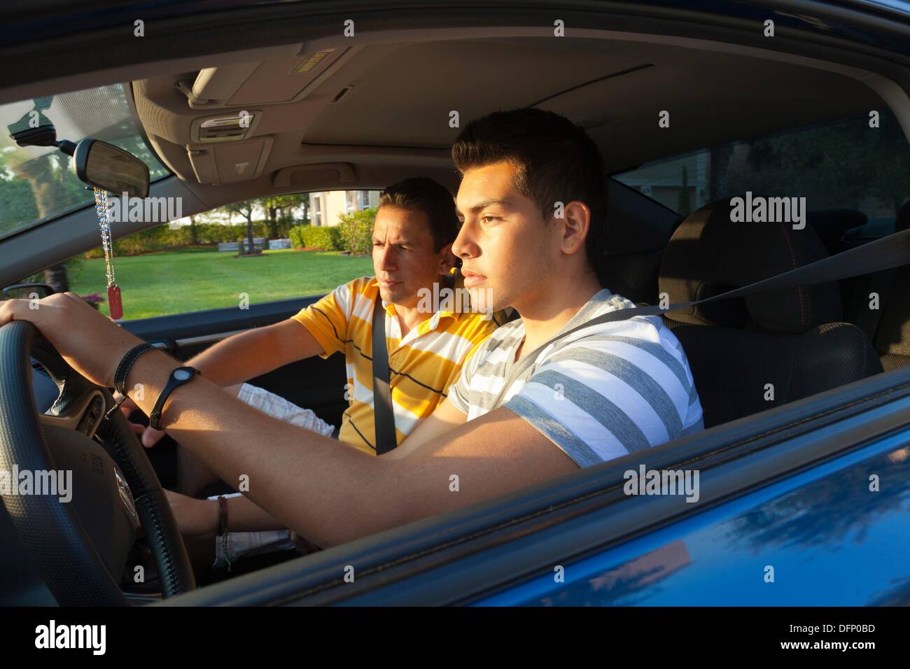 Father teaching son drive car hi-res stock photography and images - Alamy