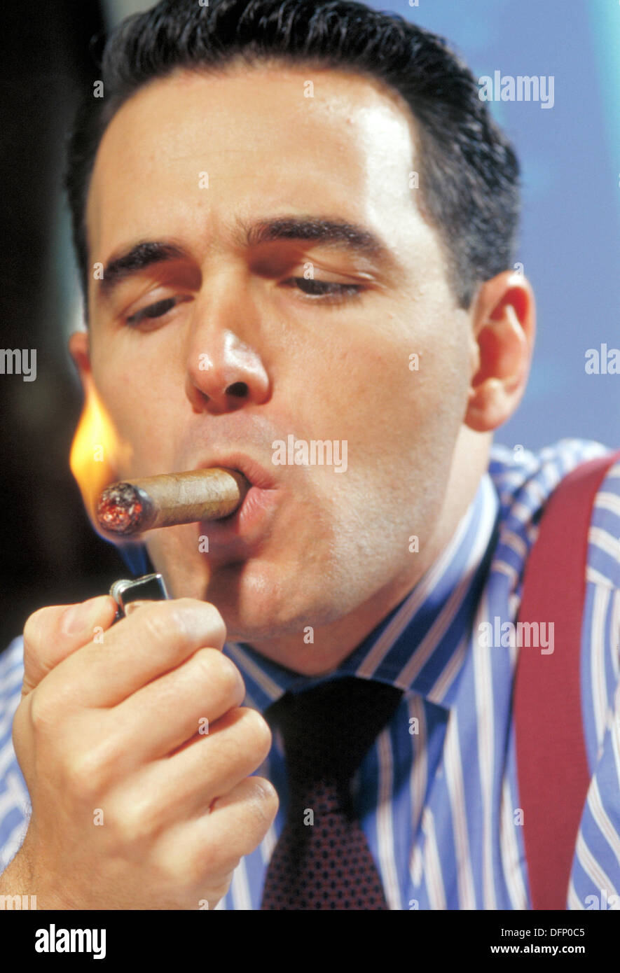 Lighting up a cigar hi-res stock photography and images - Alamy