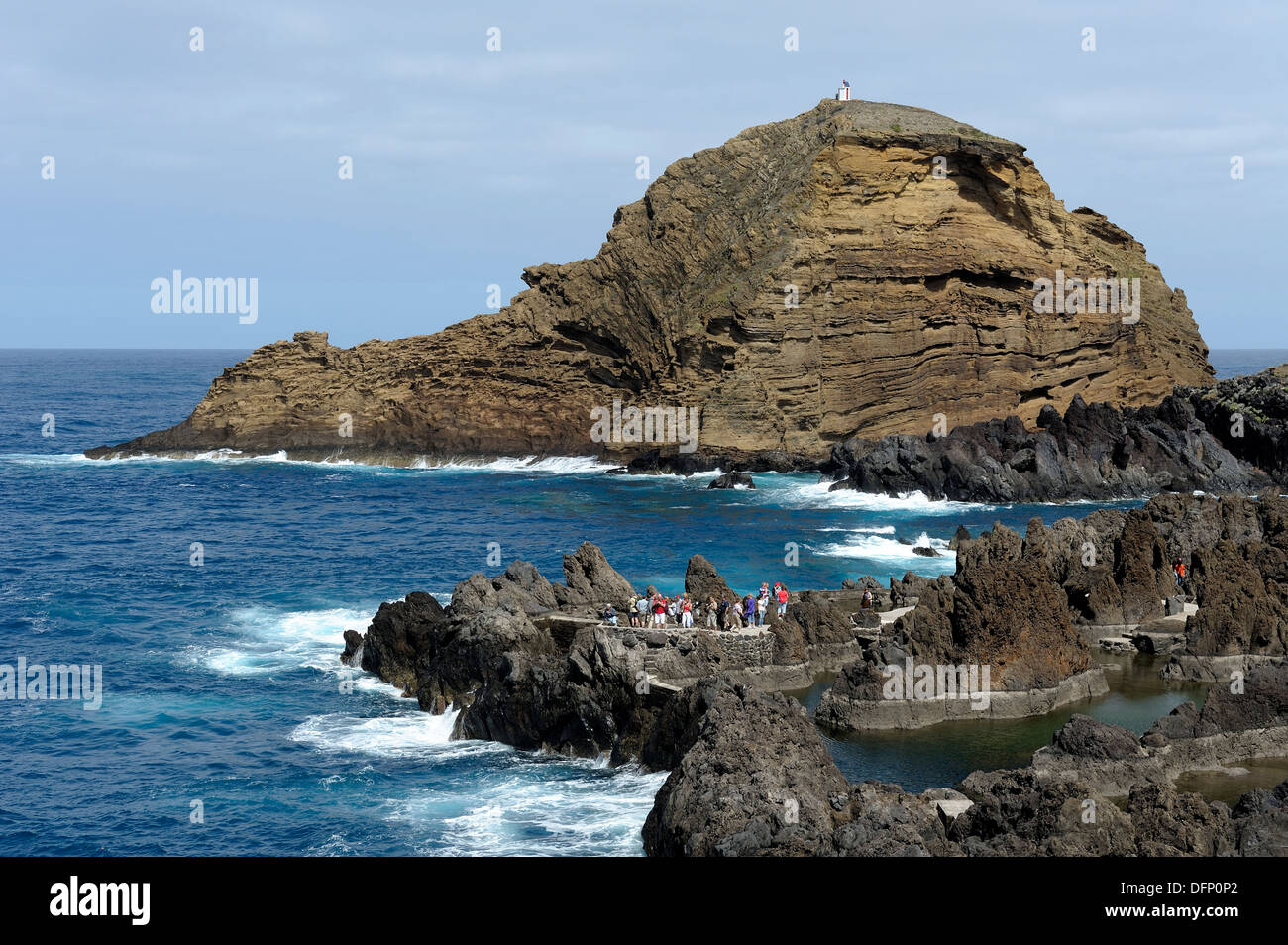 Madeira Portugal. Tourists visiting the lava pools in the coastal ...