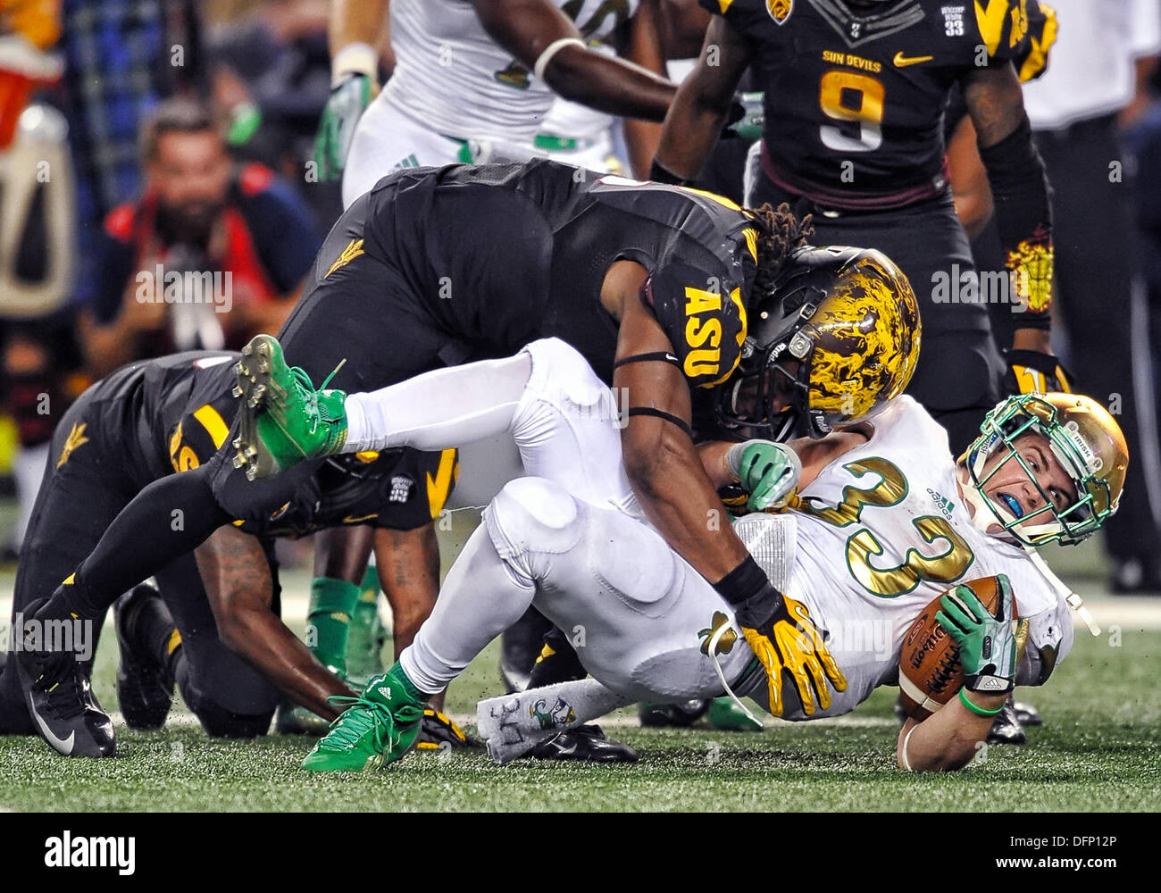 Notre Dame Fighting Irish running back Cam McDaniel (33) as he is ...