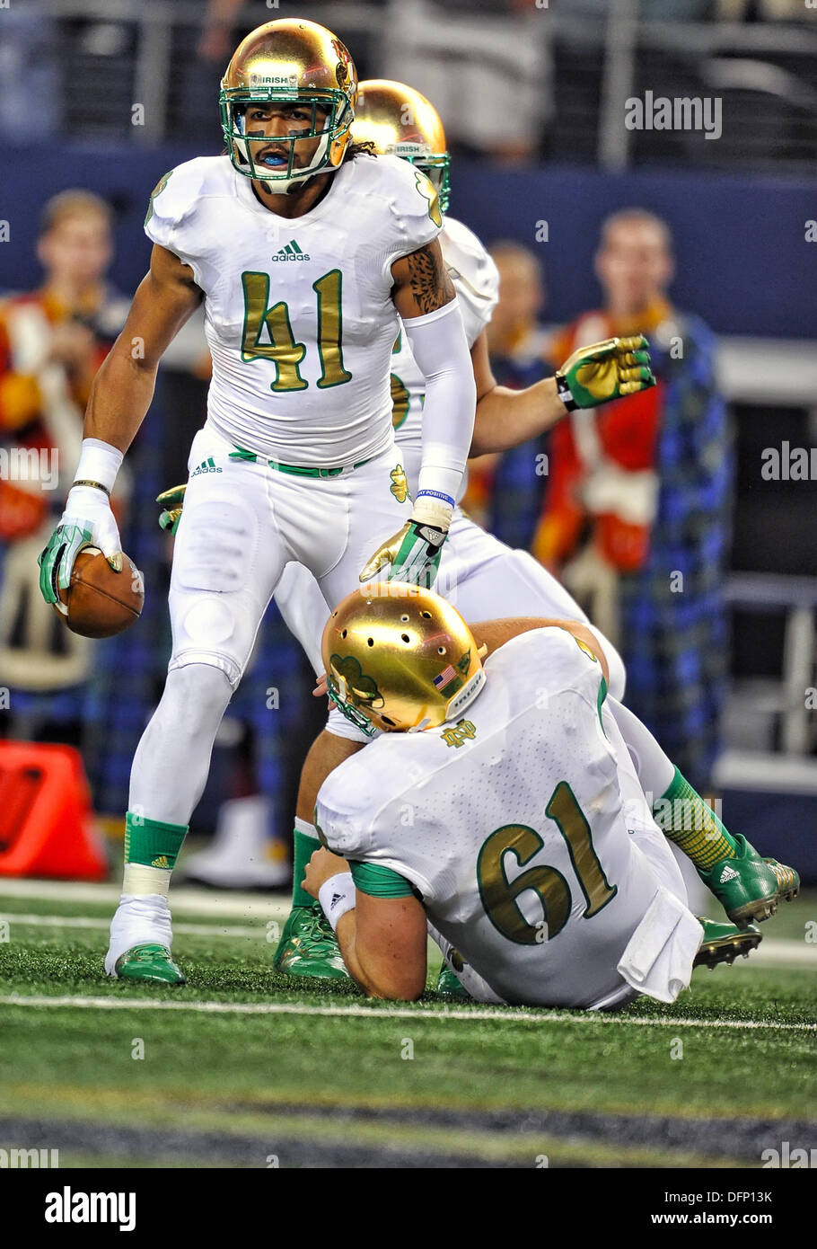 Notre Dame Fighting Irish safety Matthias Farley (41) picks up a loose ...