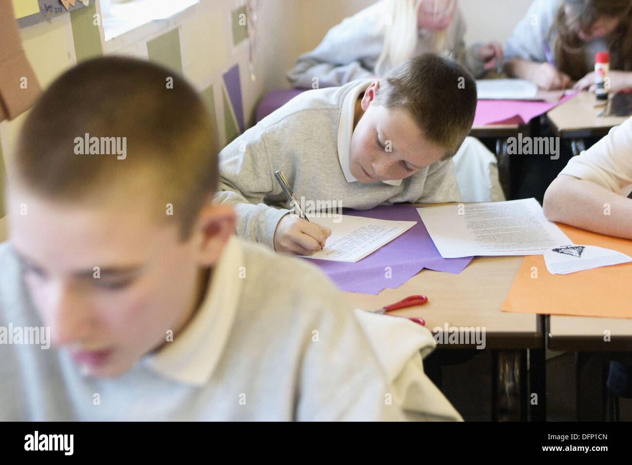 12 year old student writing hi-res stock photography and images - Alamy