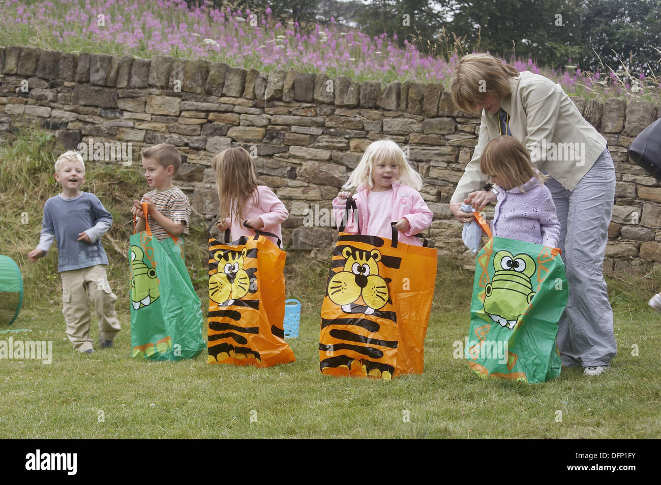 Baby in a sack hi-res stock photography and images - Alamy