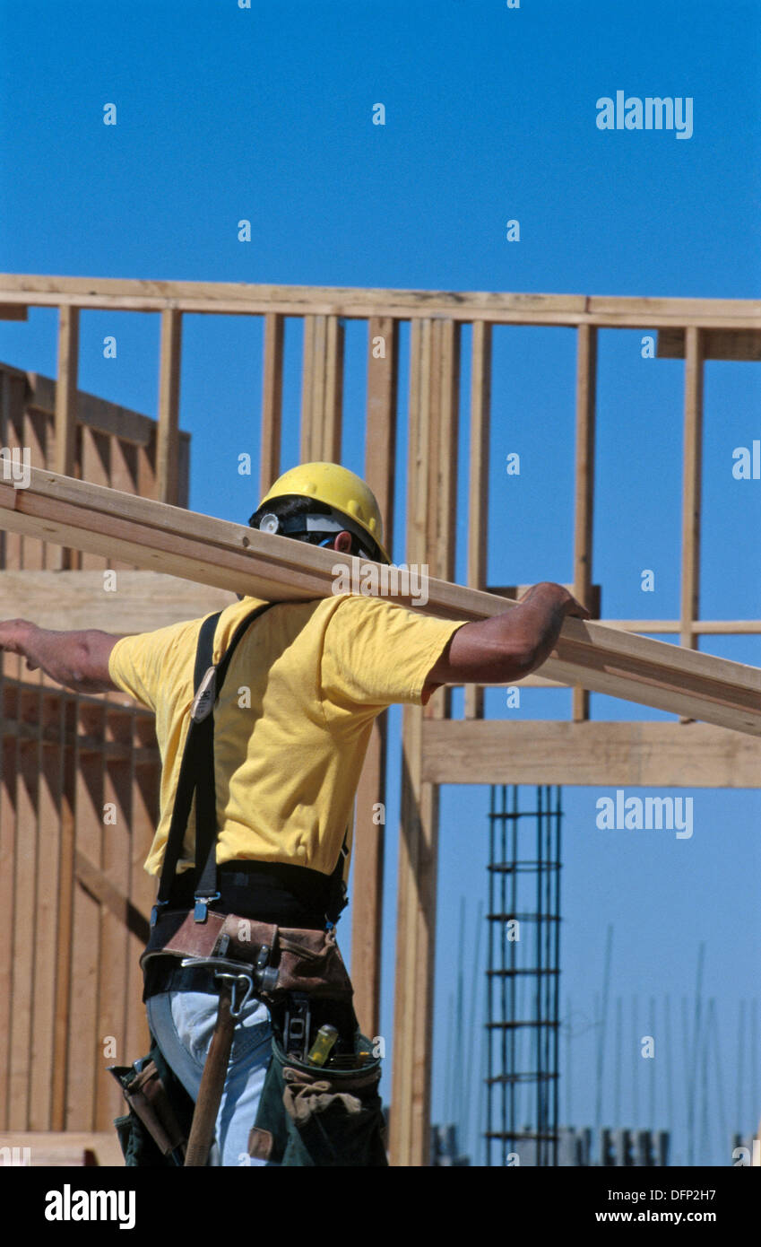Carpenter carrying wooden beam hi-res stock photography and images - Alamy