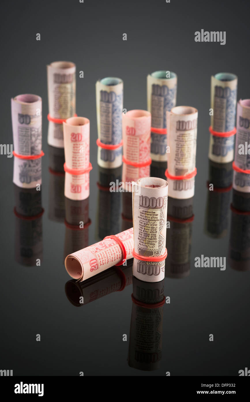 Close-up of rolled-up Indian paper currency Stock Photo - Alamy