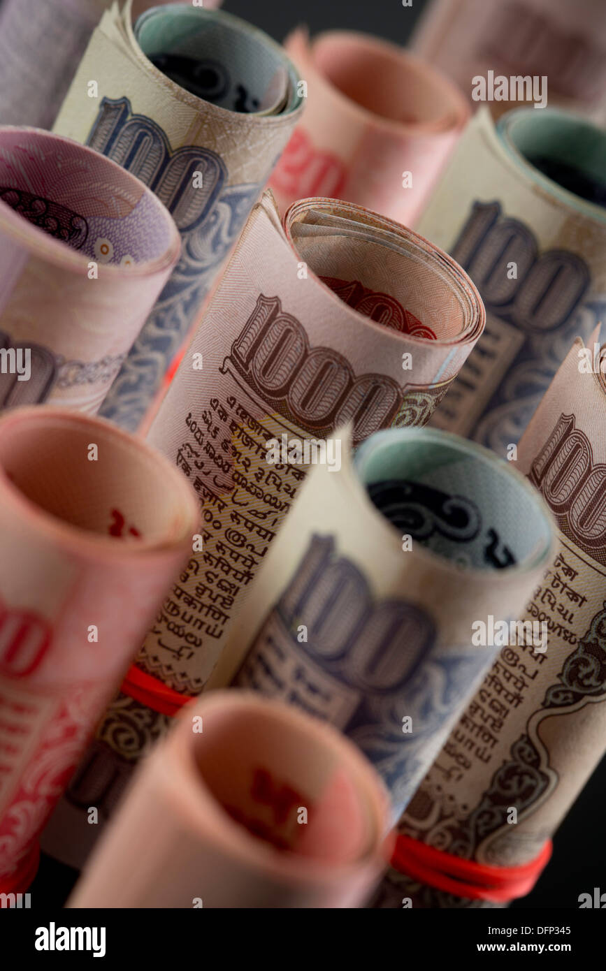 Close-up of rolled-up Indian paper currency Stock Photo - Alamy