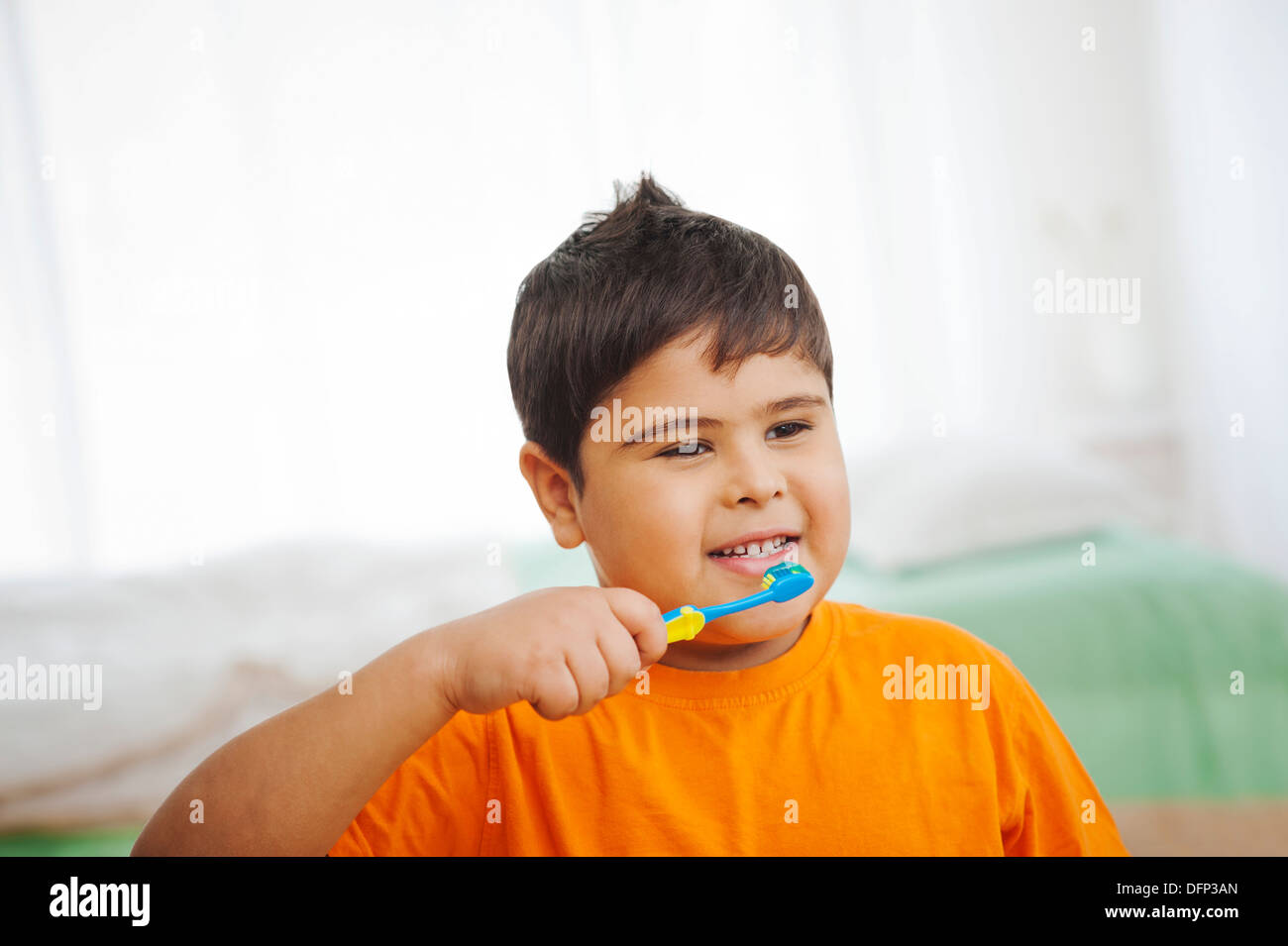 Close-up of a boy brushing his teeth Stock Photo - Alamy