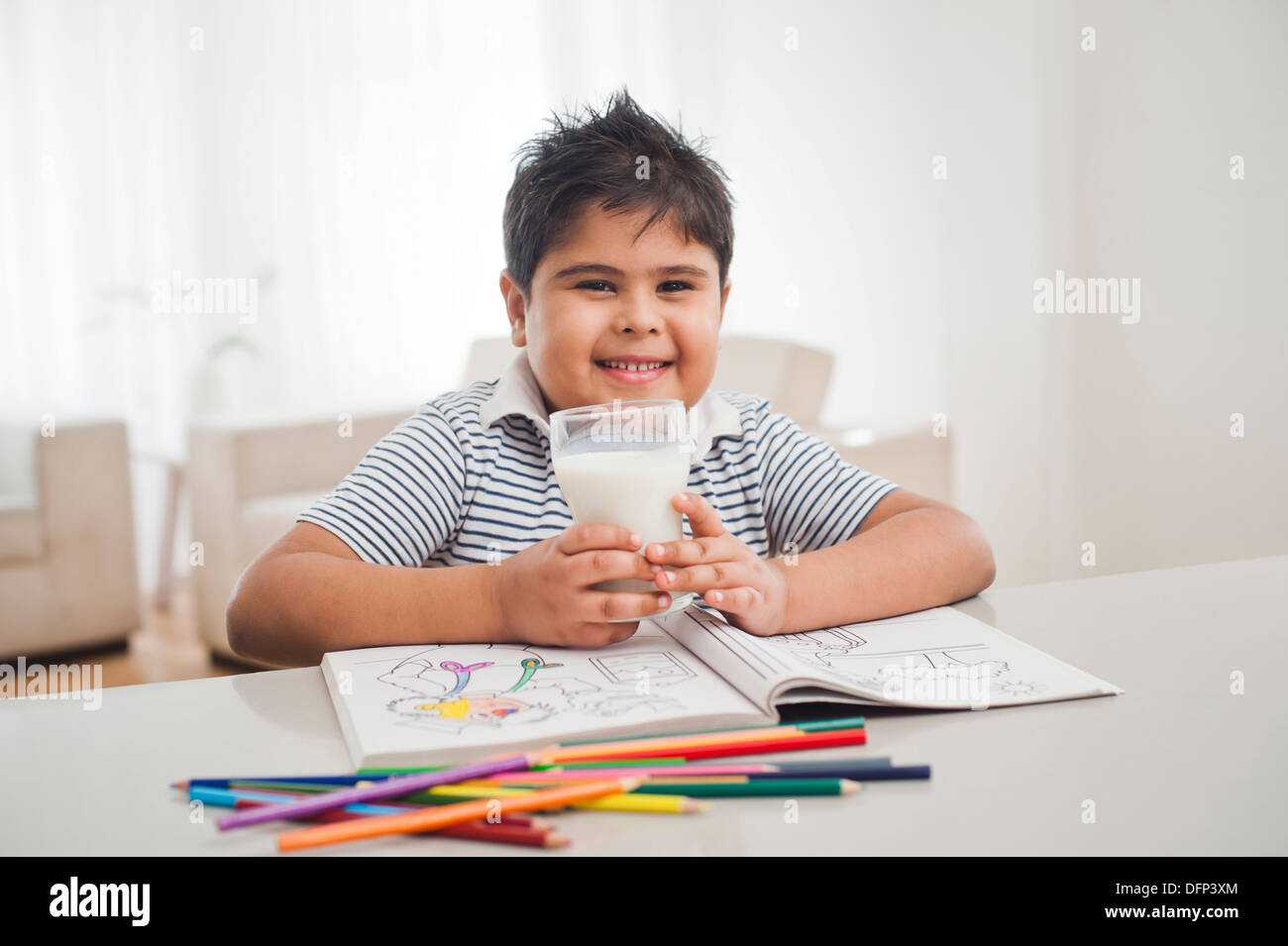 Portrait of a boy drinking milk Stock Photo - Alamy