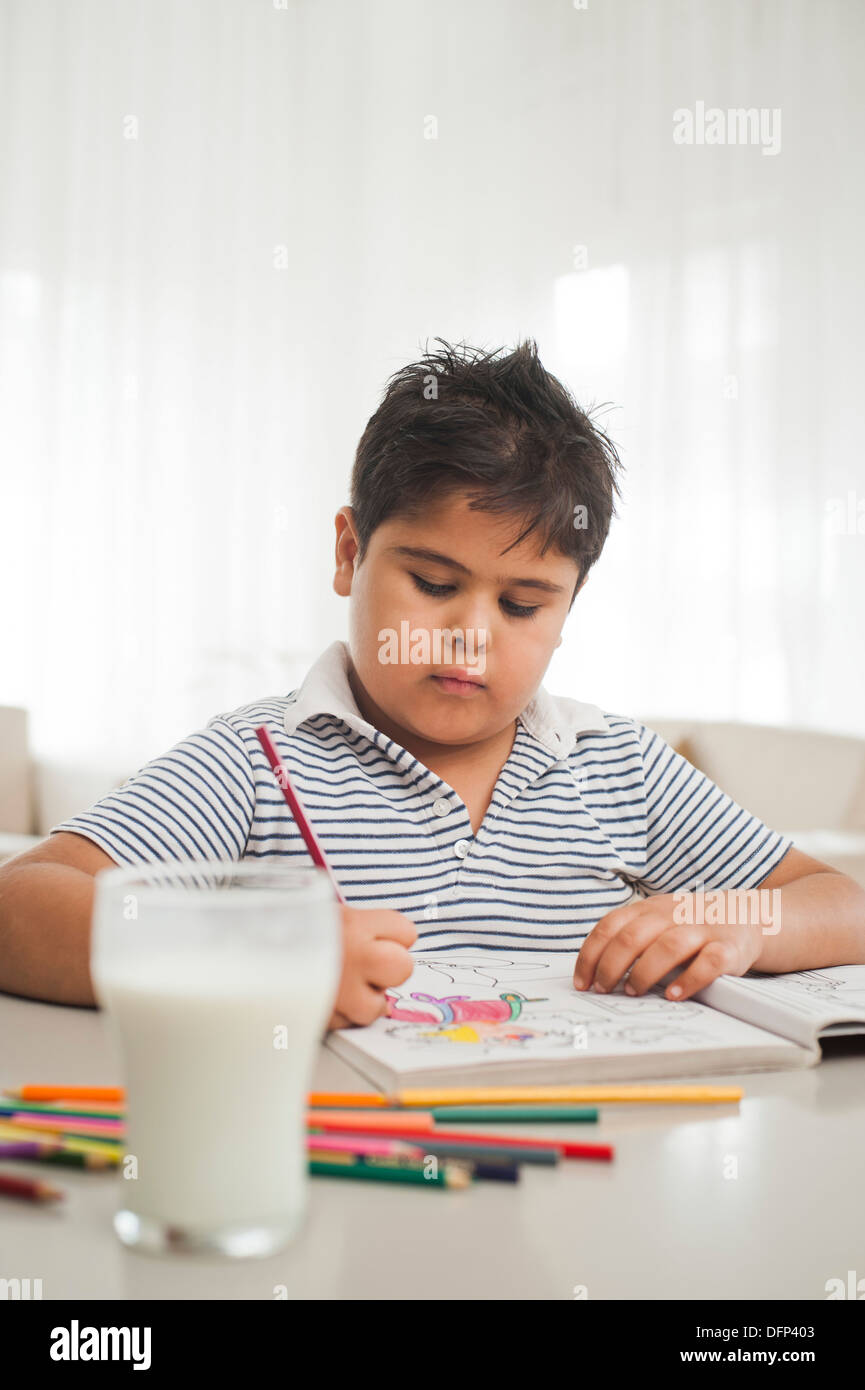 Boy coloring picture book hi-res stock photography and images - Alamy