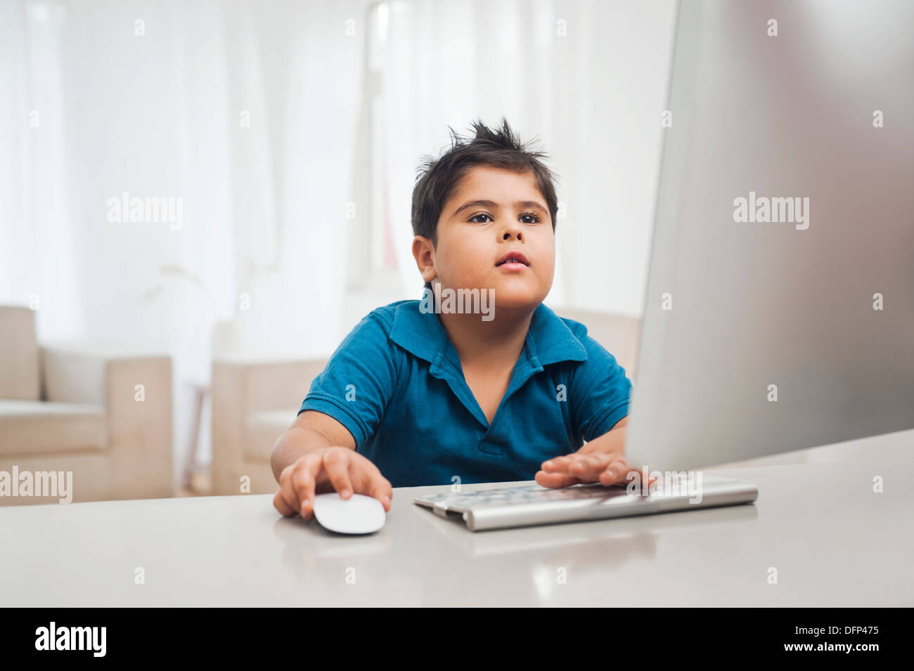 Indian boy learning computer hi-res stock photography and images - Alamy