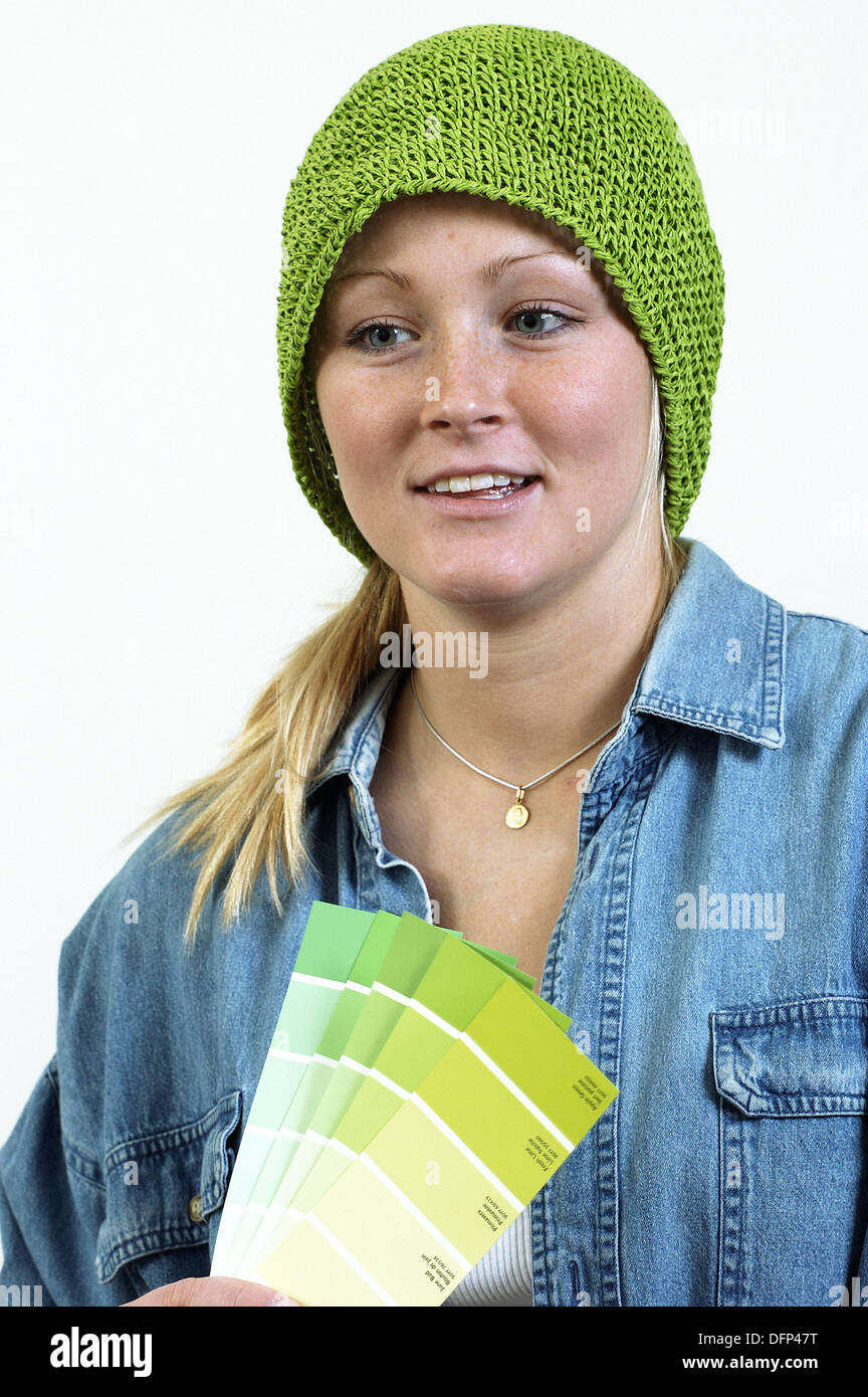 Woman picking colours, painting Stock Photo - Alamy