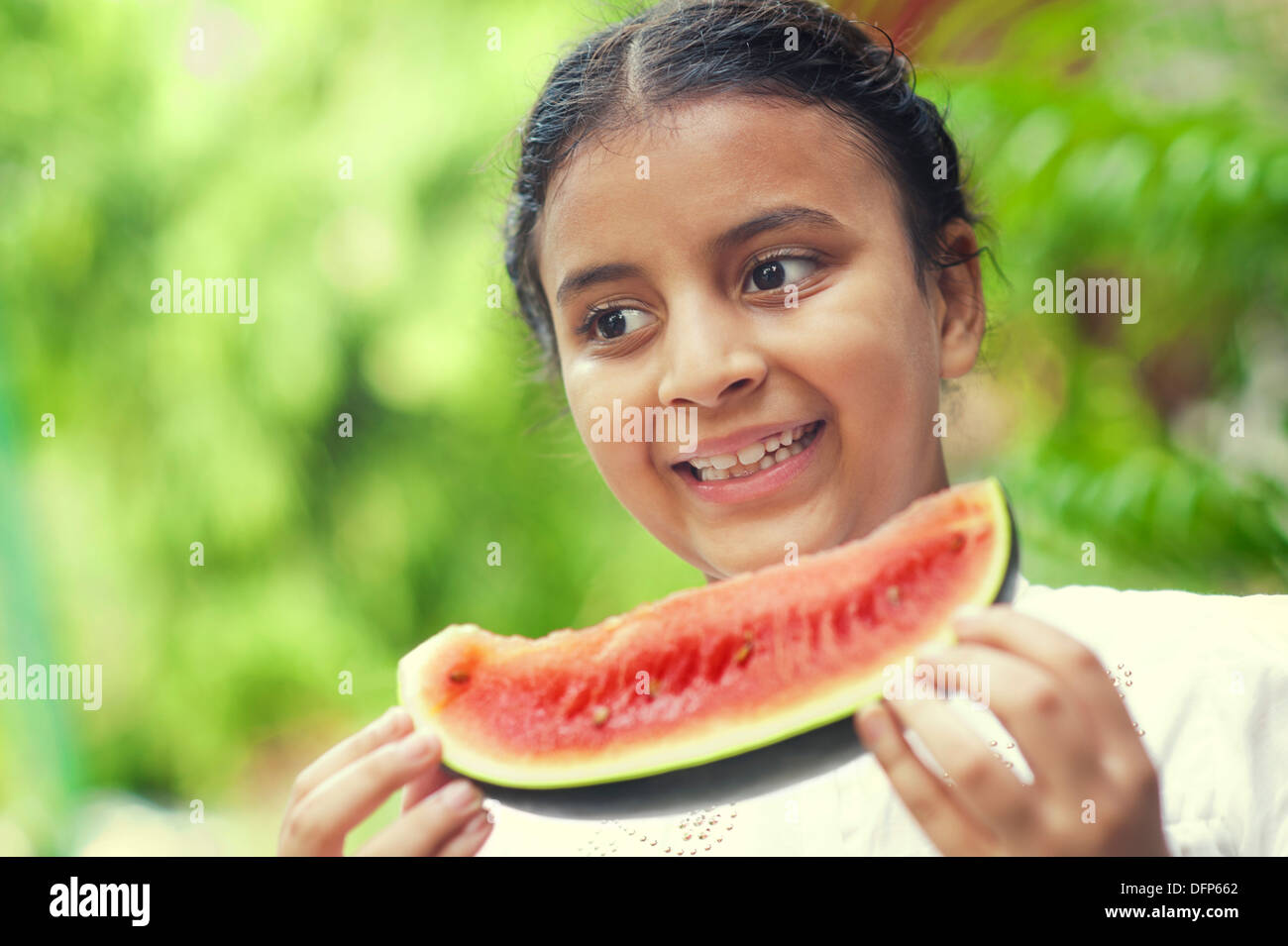 Girl eating watermelon hi-res stock photography and images - Alamy